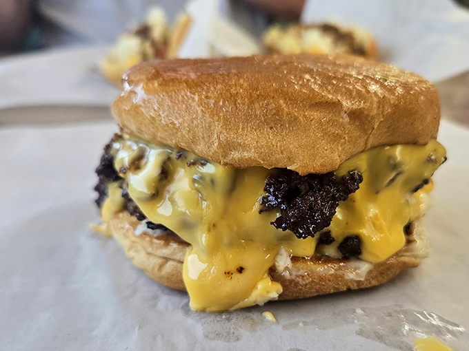 The melted cheese waterfall that launched a thousand road trips. Not all heroes wear capes&mdash;some wear sesame seed buns.