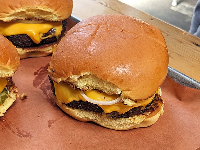 A burger that doesn't apologize for its simplicity. Cheese melted just right, like it's auditioning for a food commercial.