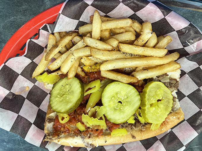 This isn't just a sandwich&mdash;it's an engineering marvel of meat, pickles, and fries that demands both your respect and your appetite.