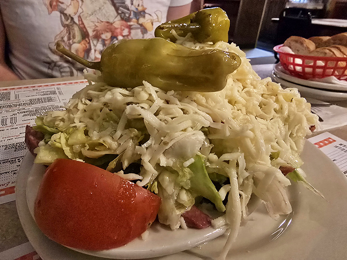 The salad that ate Cleveland! Piled high with cheese, this mountain of crisp lettuce and toppings could feed a family or one very determined diner.