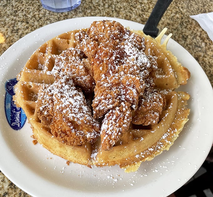Chicken and waffles: where breakfast and dinner have a delicious identity crisis. That powdered sugar snowfall seals the deal.