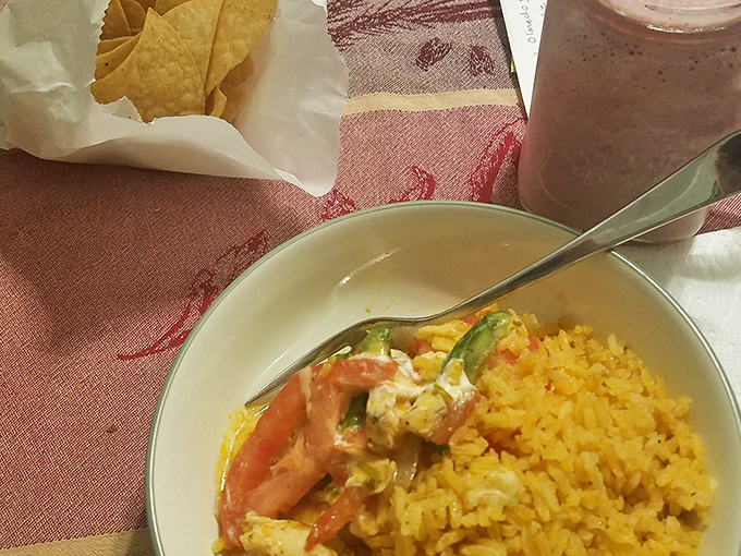 A fiesta in a bowl&mdash;vibrant chicken enchilada with sunny yellow rice that brightens both the plate and your day.