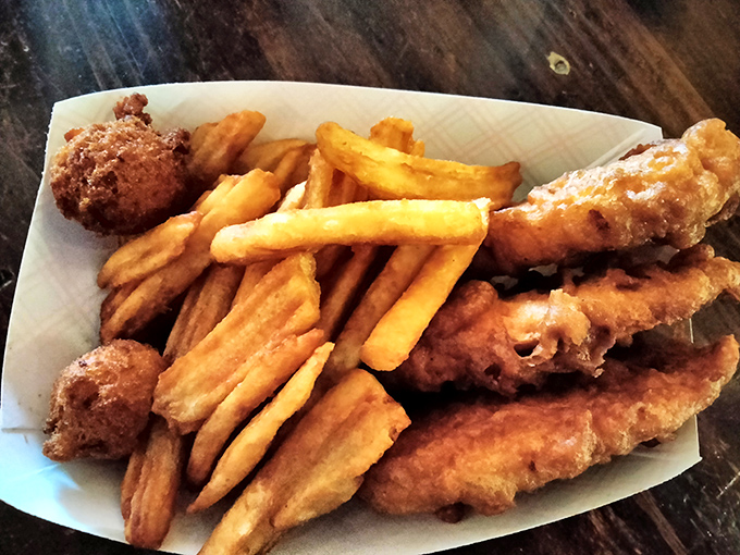 The perfect seafood alternative: chicken tenders with fries and hush puppies that could convert even the most dedicated pescatarian for one meal.