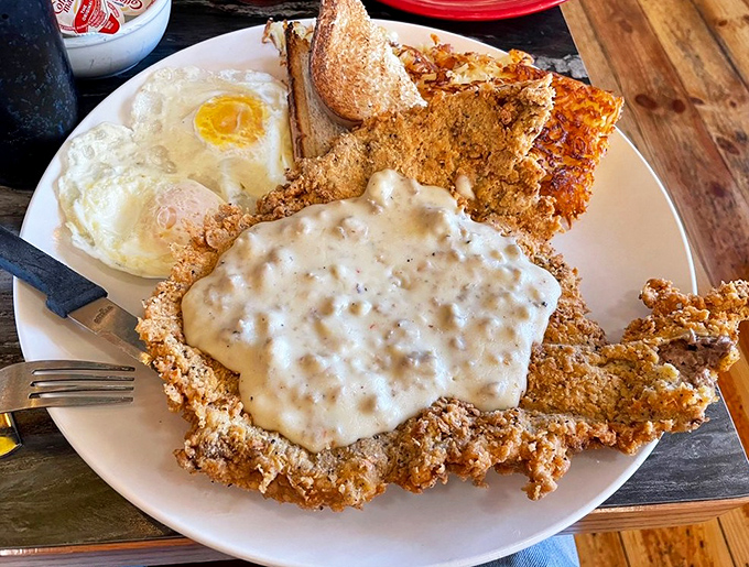 Country-fried steak that would make a chicken proud to be mistaken for it. The peppery gravy cascades like a savory waterfall.
