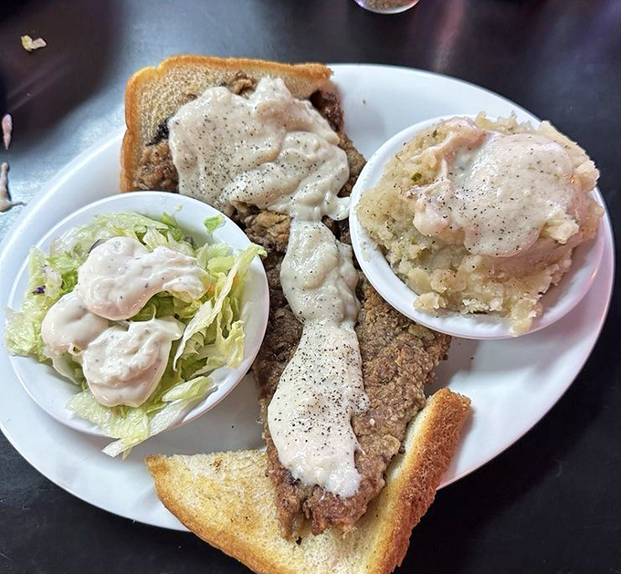 The legendary chicken fried steak with its crispy armor and peppery gravy. Your cardiologist just felt a disturbance in the Force.