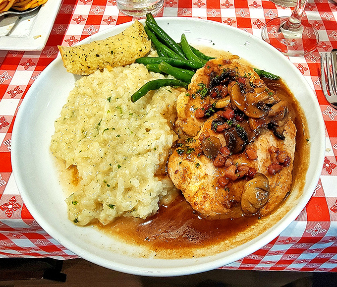 Chicken Marsala that would make your Italian neighbor weep with joy, served alongside risotto that's achieved that mythical perfect consistency.