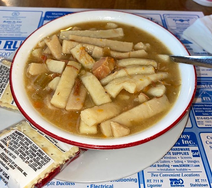 Homemade chicken noodle soup that doesn't just warm your stomach but somehow manages to retroactively cure every cold you've ever had.