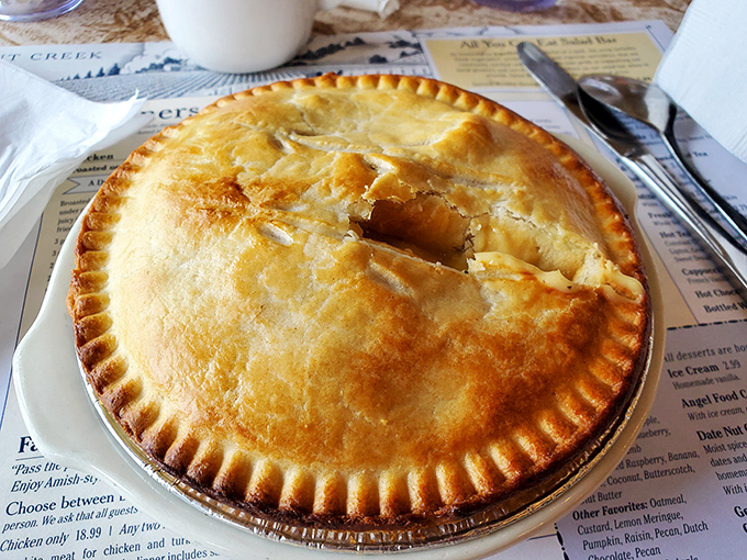 This chicken pot pie isn't just a meal&mdash;it's edible architecture. The golden dome of pastry promises treasures beneath that would make any chef weep with joy.