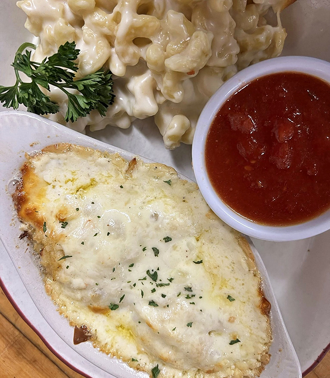 Comfort on a plate: bubbling cheese meets homemade pasta alongside what might be the most honest pot pie in America.