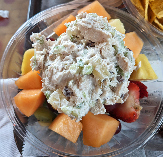 Fresh fruit and homemade chicken salad &ndash; proof that Ivanhoe's isn't just about indulgence, but knows balance too. Summer on a plate.