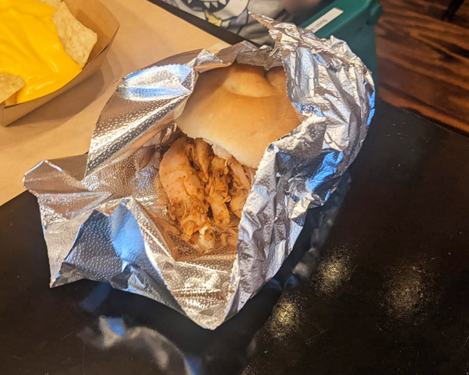 Not just a sandwich but an aluminum-wrapped treasure chest of tender chicken waiting to transform your lunch hour.