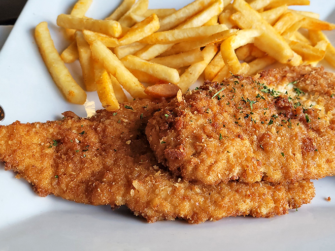 Golden-brown schnitzel that crackles with each bite, paired with crispy fries&mdash;proof that perfection doesn't need to be complicated.