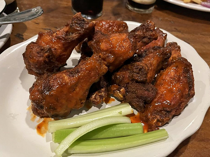 These wings aren't just crispy&mdash;they're the kind that make you temporarily forget table manners exist. Celery sticks provide the illusion of health.