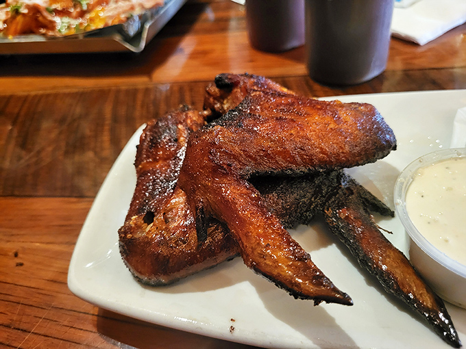 Wings with a perfect smoke-kissed exterior. These aren't your average sports bar appetizers&mdash;they've graduated to the barbecue big leagues.