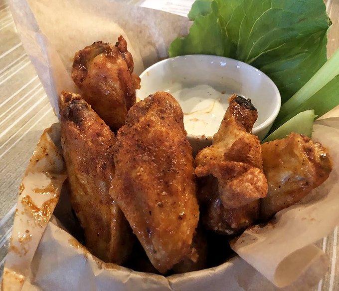 These wings aren't trying to set your mouth on fire; they're aiming for something more sophisticated &ndash; a perfect balance of crisp and juicy.