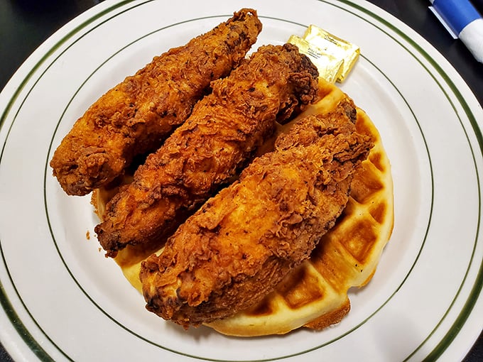 The main event: where fried chicken meets waffle in holy matrimony, blessed by maple syrup.