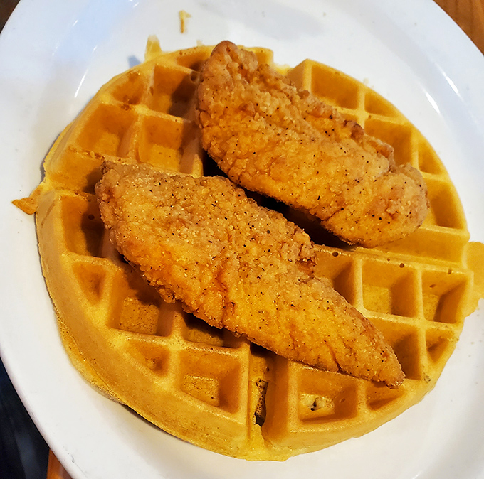 Chicken and waffles: where breakfast meets lunch in a beautiful marriage that makes you wonder why we ever separated them.