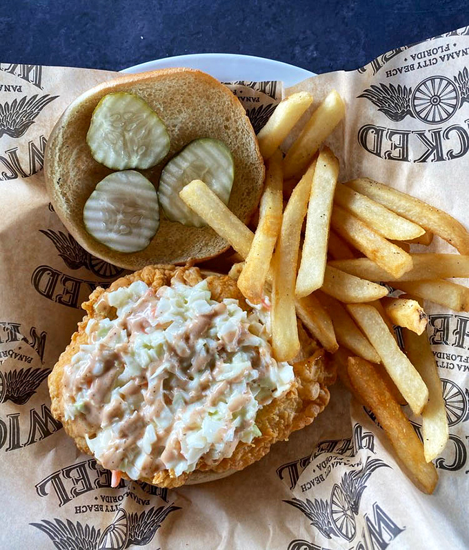 A chicken sandwich that demands two hands and your full attention. The crispy exterior gives way to juicy perfection inside.