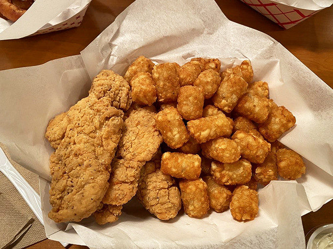 Chicken tenders and tots&mdash;the comfort food combo that proves sometimes the simplest pleasures are the most profound. No fancy sauce needed.