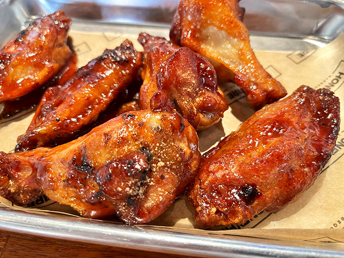 Wings that glow with a lacquered sheen of sauce &ndash; these aren't just wings, they're barbecue stained-glass windows.