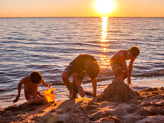Sandcastle architects at work, creating ephemeral masterpieces that will be reclaimed by the tide but live forever in family memories.