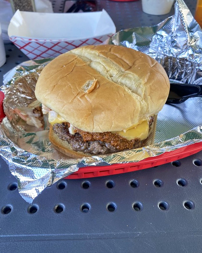 When a burger comes wrapped in foil like this, you know you're in for something special. No fancy plating needed when flavor speaks this loudly.
