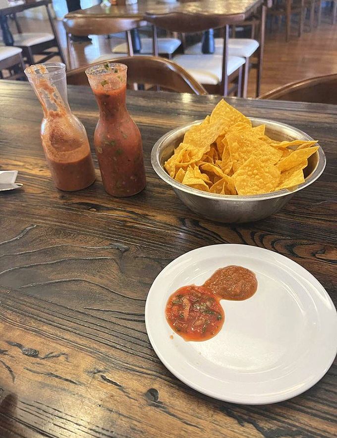 The opening act that steals the show. These house-made salsas and perfectly crisp chips have ruined store-bought versions for generations of diners.