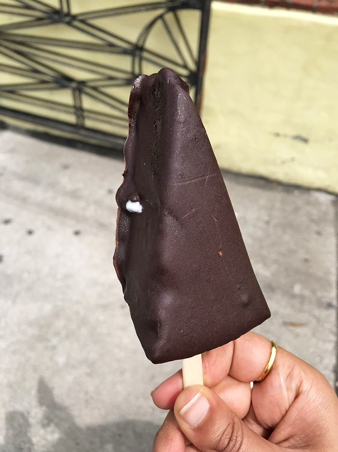 The chocolate-dipped key lime pie on a stick&mdash;proof that someone looked at perfection and thought, "You know what this needs? A tuxedo."