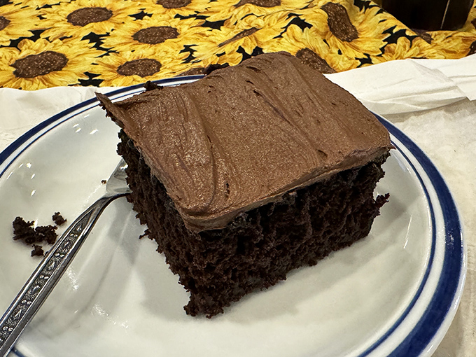 Chocolate cake that makes diets disappear faster than your uncle's magic tricks. Dense, rich, and unapologetically decadent.