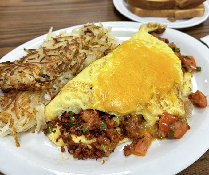 Chorizo brings the party to this omelet, turning breakfast into a delicious fiesta on a plate.