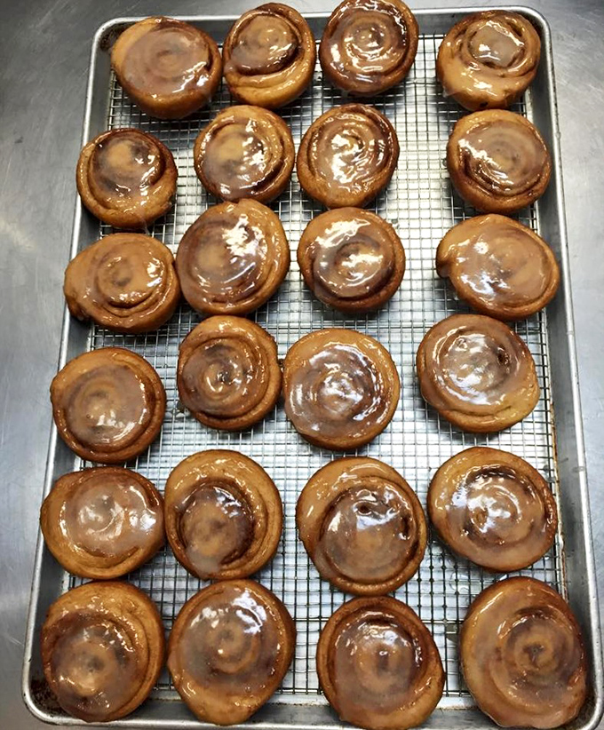 These cinnamon rolls glisten like edible jewelry, each swirl promising a sugar rush worth writing home about.