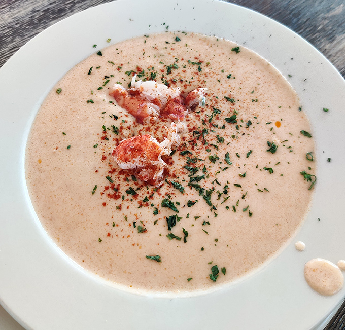 This isn't just clam chowder; it's a creamy New England hug in a bowl, complete with tender seafood and a sprinkle of herbs.