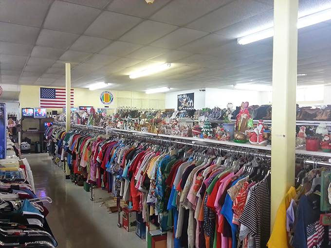 Racks of clothing stretch endlessly, creating a textile forest where polyester trees grow next to cotton bushes.