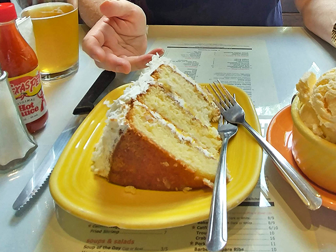 Layer cake that would make even the most sophisticated pastry chef weep with joy. Each forkful is like a time machine to childhood celebrations.