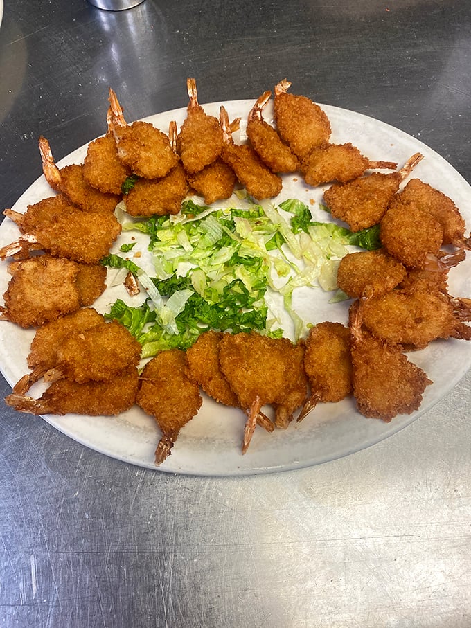 Coconut shrimp arranged in a perfect circle&mdash;like a crispy seafood sundial marking the time until your next bite.