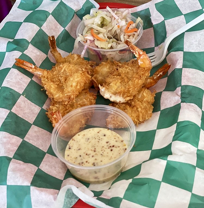 Coconut shrimp that actually taste like coconut, not just the idea of it. That dipping sauce deserves its own fan club.