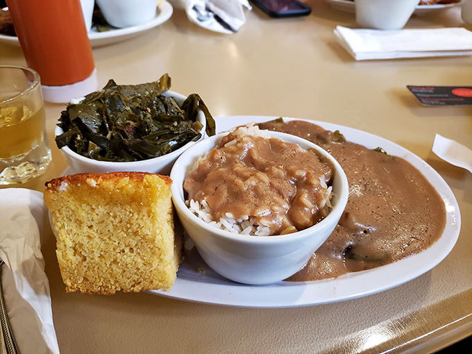 These aren't just collard greens&mdash;they're a Southern heirloom served with cornbread that could make your grandmother question her own recipe.