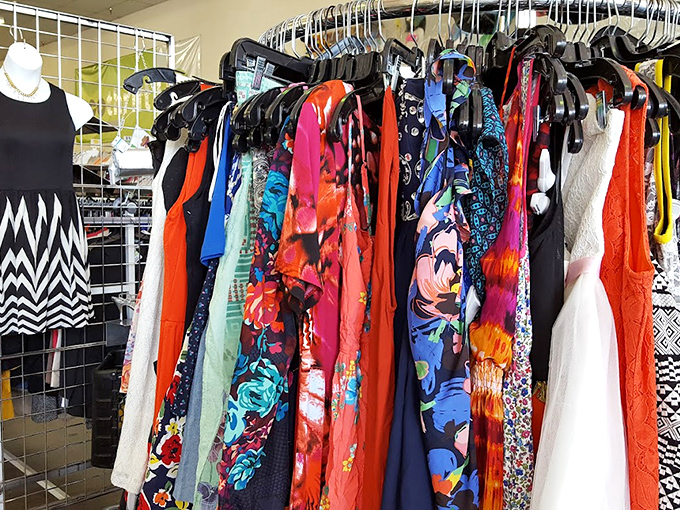 A textile rainbow that puts designer boutiques to shame. These racks hold everything from casual Friday to "where did you get THAT?" statement pieces.