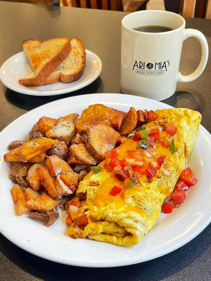 The breakfast trinity: a fluffy omelet, seasoned home fries, and buttery toast. Monday mornings should always begin this beautifully.