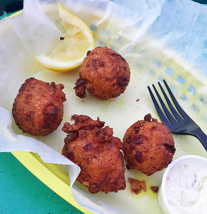Conch fritters that could make a Bahamian weep with joy. Crispy outside, tender inside&mdash;like the best of us. 