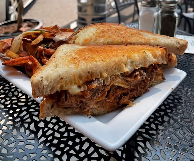 This isn't just a sandwich&mdash;it's architecture. Layers of tender corned beef and melted cheese create the Frank Lloyd Wright of lunch options.