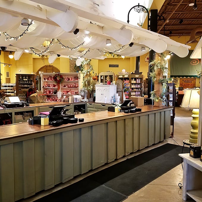 Rustic beams and country charm create the perfect backdrop for this checkout counter, where wallets willingly surrender to candle temptation.