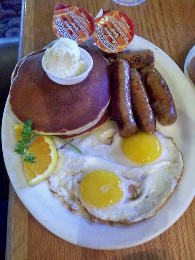 The classic American breakfast trifecta&mdash;pancakes, eggs, and sausage&mdash;executed with the confidence of a diner that knows exactly what you need.