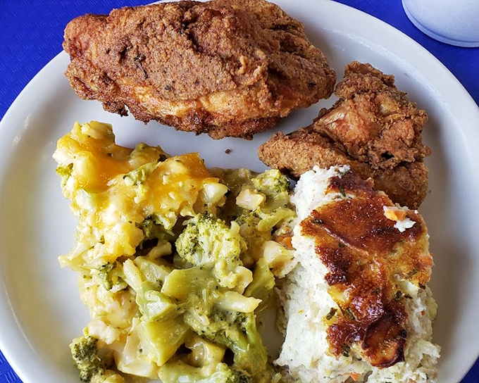 Fried chicken with that mythical crispy-outside-juicy-inside perfection, paired with broccoli casserole that might convert vegetable skeptics.