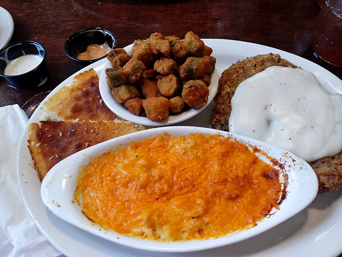 A plate that screams "Southern comfort"&mdash;mac and cheese that's traveled to heaven and back, alongside crispy okra and cornbread worth fighting over.