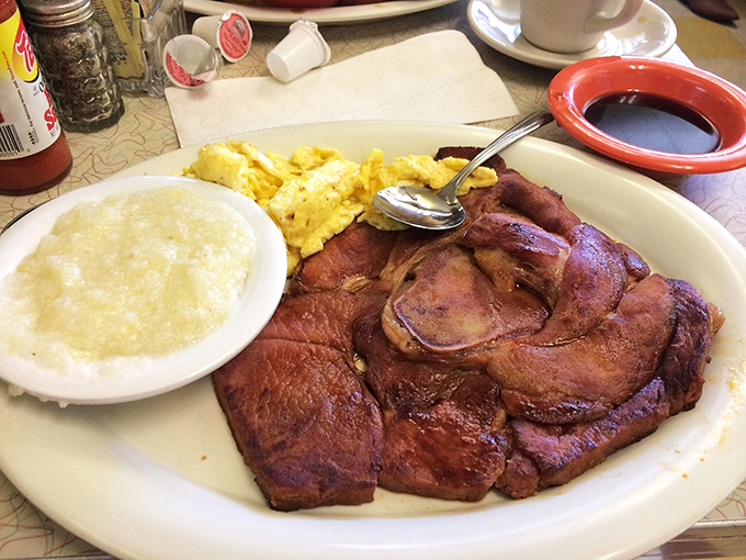 Country ham and grits&mdash;the breakfast equivalent of a power couple. This plate has probably solved more of Atlanta's problems than any boardroom meeting ever could.