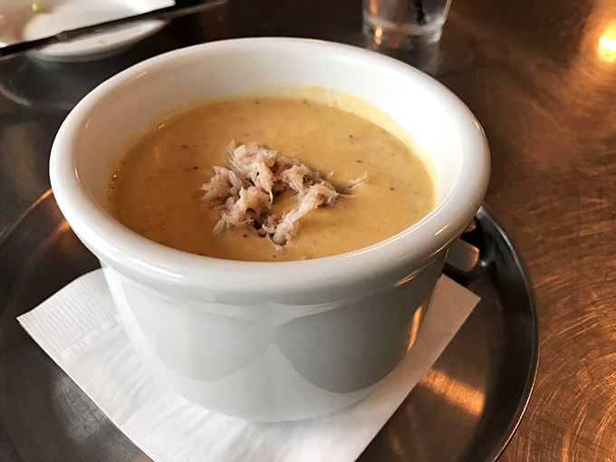 The legendary crab bisque in all its glory&mdash;liquid gold topped with sweet crab meat that makes you wonder why you've wasted time on lesser soups.