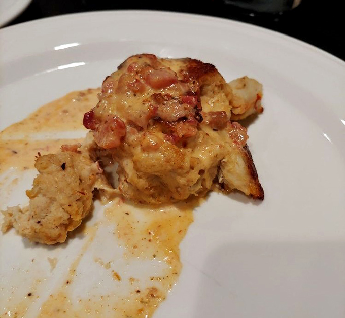 This crab cake isn't playing games—it's all about sweet, delicate crab meat with just enough binding to keep the party together.