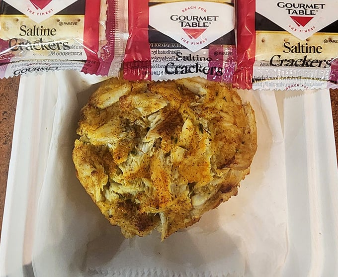 A proper Maryland crab cake&mdash;mostly crab, minimal filler, maximum flavor&mdash;served with saltines because sometimes perfection needs no embellishment.