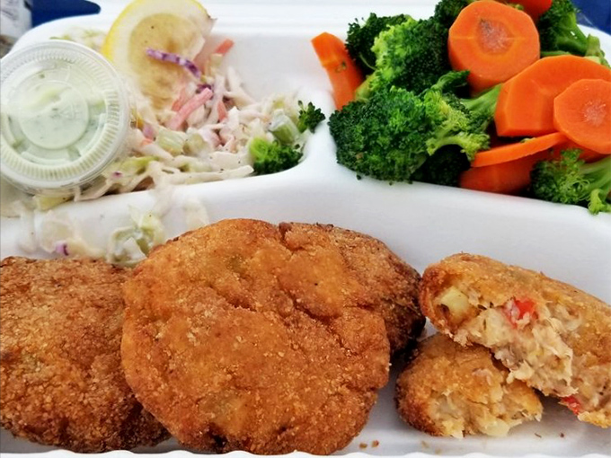 Golden-crusted crab cakes with a side of fresh veggies. Crispy exterior giving way to sweet, delicate crab&mdash;the textural tango we all crave.